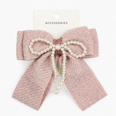 China Elegant Tweed & Jacquard Ribbon Bow Hair Clip with Faux Pearl Tassel Accent – French Style Oversized Hair Accessory for Women for sale