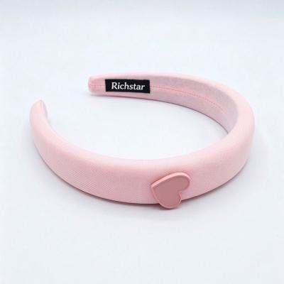 China Custom Logo Padded Fabric Headband with Heart Emblem – Wholesale OEM/ODM Women's Hair Accessories for sale