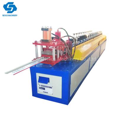 China Nexus Perforated Spandrel Panel Classic Rib Sheet Roll Forming Machine for sale