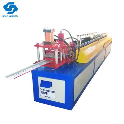 China 4 Inches Spandrel Sheet Roll Forming Machine Nexus Spandrel Roof Profile Making Machinery for sale