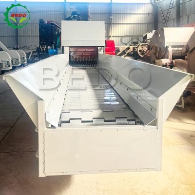 Китай Гидравлический двигатель питания конвейер мощность дровяной дробильной машины с 235HP основная мощность и 25-35mm размер чипа продается