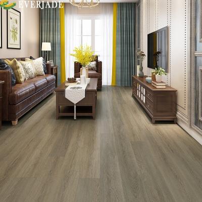 Cina Pavimenti in legno reale di 12 mm di rivestimento di forno di aringhe di Chevron, di marmo, di spugna di Eir, di quercia, di aringhe di spc in vendita
