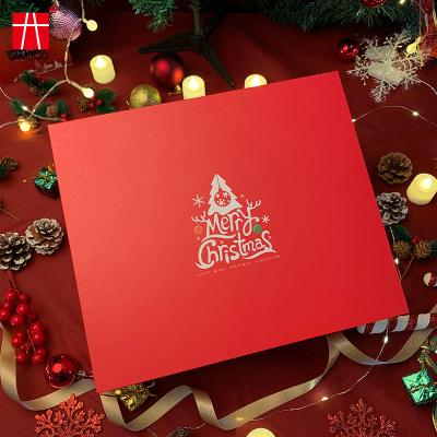 中国 カスタムプリントクリスマスパッケージファンシーダンボールギフトボックスインサート付き 販売のため