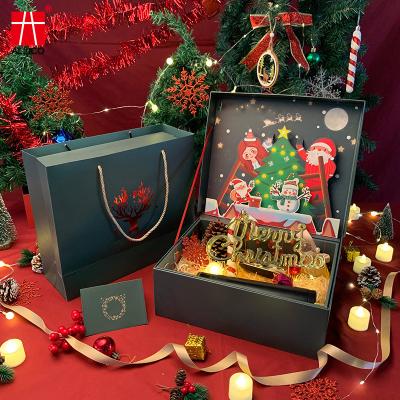 中国 カスタムプリントクリスマスパッケージファンシーダンボールギフトボックスインサート付き 販売のため
