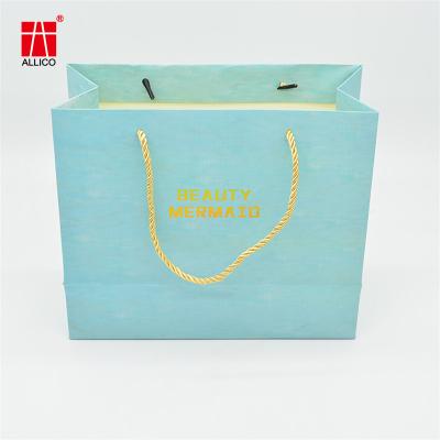 Cina Progetti la borsa per il cliente d'imballaggio di compera dei gioielli della maniglia del nastro dell'abbigliamento cosmetico blu del regalo in vendita