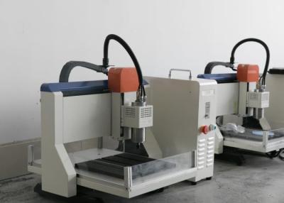 中国 セリウム標準的な小型CNCの彫版機械1.2KW 0-4000mm/Min最高速度 販売のため