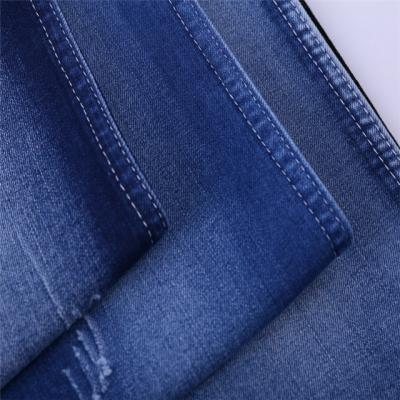 China ripped jeans fabric material, denim fabric, jeans cloth, jeans fabric,7.7oz weight denim fabric for sale