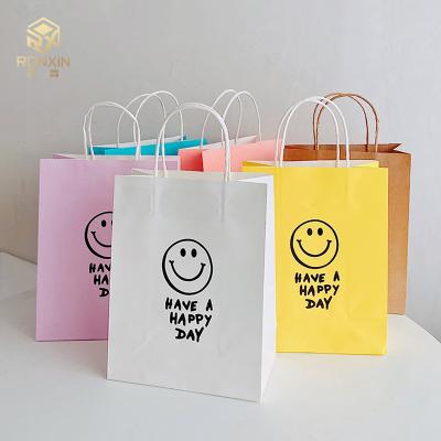 Cina l'altezza di 26cm ha ricoperto il regalo di carta giallo insacca riutilizzabile con il fronte di sorriso in vendita