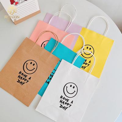 Cina l'altezza di 26cm ha ricoperto il regalo di carta giallo insacca riutilizzabile con il fronte di sorriso in vendita