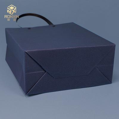 Cina scatola di stoccaggio di carta del regalo del cartone CMYK di 2mm con la maniglia del nastro per l'imballaggio del regalo in vendita