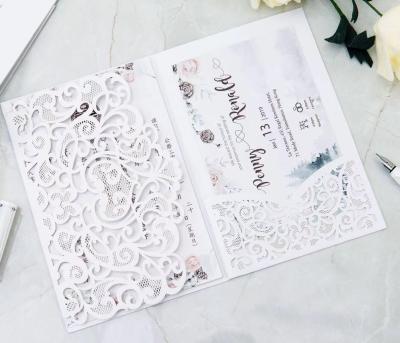 Cina Carte rosa di Art Paper Laser Cut Wedding con il nastro per la festa nuziale in vendita