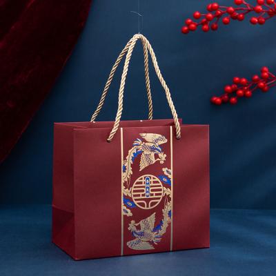 China Gift Packaging Printed Paper Shopping Bag With Handles Rope Recyclable for sale