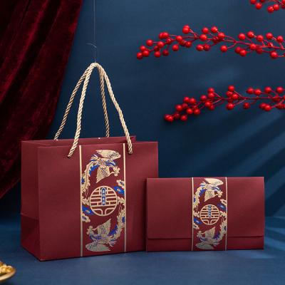 China Gift Packaging Printed Paper Shopping Bag With Handles Rope Recyclable for sale
