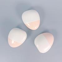 China 50ml Capacity PE Mini Sunscreen Bottle Egg Round Packaging Solution Suitable for Sunscreen and Lotion Products for sale