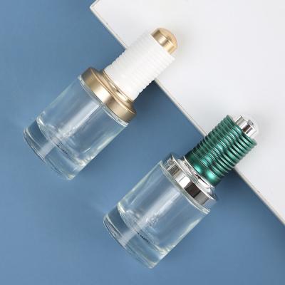 China Garrafa branca do conta-gotas da garrafa de vidro feita sob encomenda do soro de Logo Green Clear Gold 30ml à venda