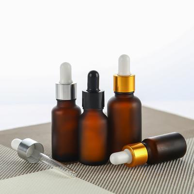 China Fancy Oil Amber Glass Dropper Bottle 30ml 50ml 100ml for Personal Care Serum Gold Cosmetic Glass Body Dropper Bottle for sale