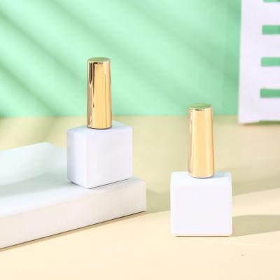 China OEM Custom Logo Design Unique Square White Color Uv Gel Containers Glass Empty Nail Polish Bottles with Brush Chrome Golden Cap for sale