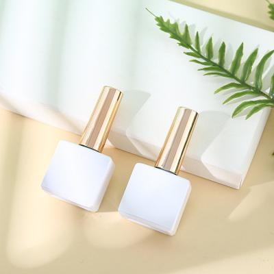 China OEM Custom Logo Design Unique Square White Color Uv Gel Containers Glass Empty Nail Polish Bottles with Brush Chrome Golden Cap for sale