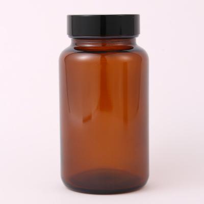 China 8oz 16oz 250ml 300ml 400ml 500ml Amber Brown Pharmaceutical Boston Round Glass Capsule Bottle with Black Cap and Induction Liner for sale