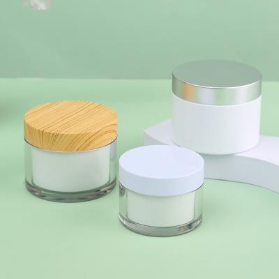 China OEM ODM Clear Double Wall Plastic Jars with Lids 4 oz Black Lids Clear Pet 8 oz Plastic Cosmetic Jars Cream Set 150g 200g 300g for sale