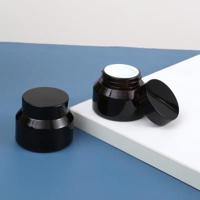 China Sloping Shoulders 15g 20g 30g 50g 100g Amber Black Matte Glass Cream Jar with Glossy Black Cap Samples Process 2-3 days for sale