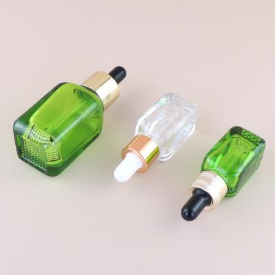China 15ml 30ml 50ml Unique Green Square Glass Bottle Cosmetic Oil Glass Dropper Bottles Sealing Type Dropper Industrial Cosmetic for sale