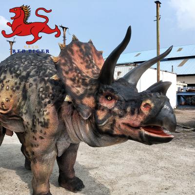 Китай Аниматоронный костюм динозавра трицератопса с скрытыми ногами для тематических парков продается