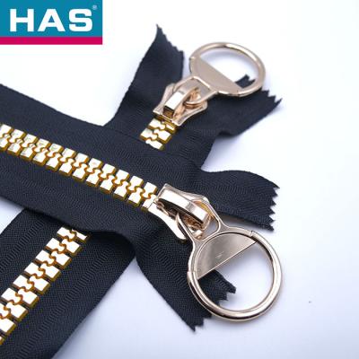 China Zipper de ouro preto de resina #3 #5 #8 #10 Zipper de ouro metálico para bolsas de mão à venda
