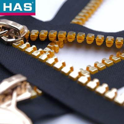 China Zipper de ouro preto de resina #3 #5 #8 #10 Zipper de ouro metálico para bolsas de mão à venda