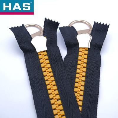 China Zipper de ouro preto de resina #3 #5 #8 #10 Zipper de ouro metálico para bolsas de mão à venda