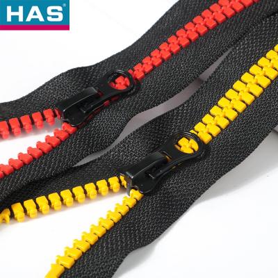 China Cerradura de dientes de resina duradera en varios colores ligera y conveniente para la ropa en venta