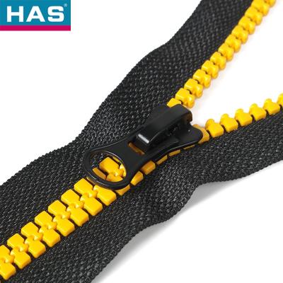 China Cerradura de dientes de resina duradera en varios colores ligera y conveniente para la ropa en venta