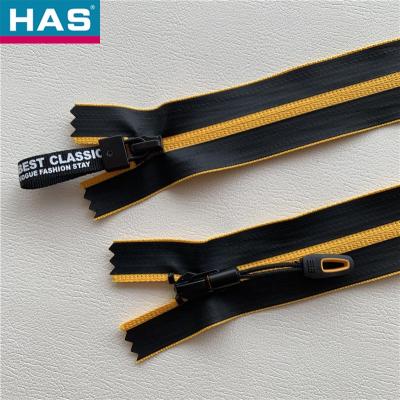 China #5 Nylon Invisible Zipper with Black Reflective Strip Colorful Paste for Clothing for sale