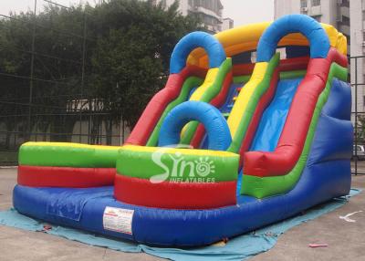 China 5mts hoge grote dubbele steeg opblaasbare die dia met boog van 0.55mm het geteerde zeildoek van pvc wordt gemaakt Te koop