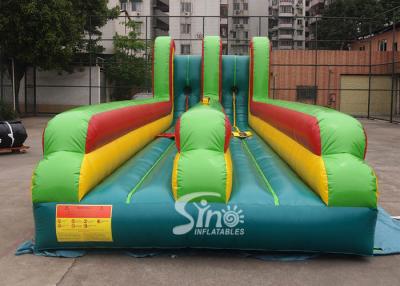 中国 10m長い二重車線の子供Nの大人の膨脹可能なバンジーは相互作用のゲームのために動きます 販売のため