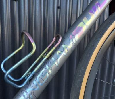 China Outdoor Sports Bicycle Water Bottle Holder  Gradient Color  Sandblasting  Oxidation  Custom Multiple Colors for sale