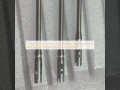Customized processing of sandblasting scale for stainless steel capillary slotted flared reducing head.