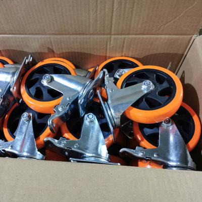 Китай Рицинусы шарнирного соединения колеса ядра PVC обязанности Meidum 5 дюймов оранжевые неубедительные с двойными тормозами YLcaster продается