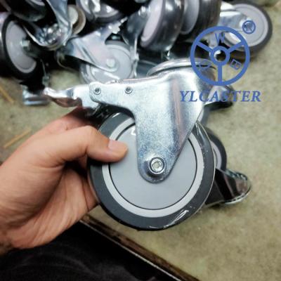 Китай Тип рицинусы отверстия для болтов 4 дюймов Lockable вагонетки колеса мягких рицинусов TPR серые продается