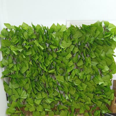 China UV-Resistant PVC Artificial Leaf Fence 40cm for Garden Privacy for sale