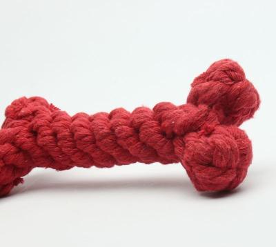 Cina L'osso adorabile della corda del cane del cotone duro/masticazione rossa della corda del cucciolo gioca la dimensione di 16cm in vendita