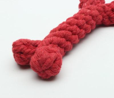 Cina L'osso adorabile della corda del cane del cotone duro/masticazione rossa della corda del cucciolo gioca la dimensione di 16cm in vendita