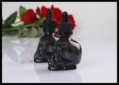 Cina bottiglia di vetro del contagoccia di forma del cranio 30ml del succo liquido di vetro della bottiglia E E in vendita