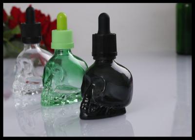 Cina bottiglia di vetro del contagoccia di forma del cranio 30ml del succo liquido di vetro della bottiglia E E in vendita