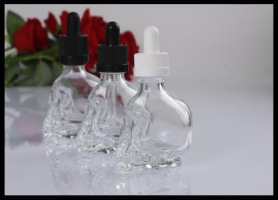 Cina bottiglia di vetro del contagoccia di forma del cranio 30ml del succo liquido di vetro della bottiglia E E in vendita