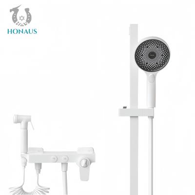 Cina Doccia a valvola a luce con tre maniglie, in ottone premium, con pistola a spruzzo a pressione, bianco in vendita