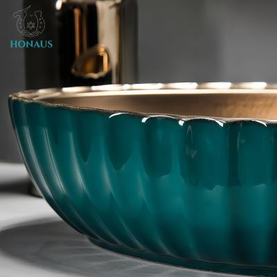 Cina Bagno vaschino di lavanderia in ceramica realizzato disegno d'arte forma di uovo elettroplata in vendita