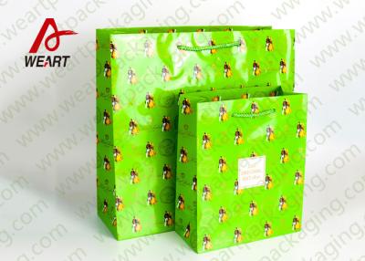 China C1S Card Paper Christmas Present Bag , PP Flat Ribbon Christmas Brown Paper Bags for sale