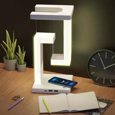 Cina Moderna lampada da scrivania a LED senza fili galleggiante magnetica di PLA in vendita