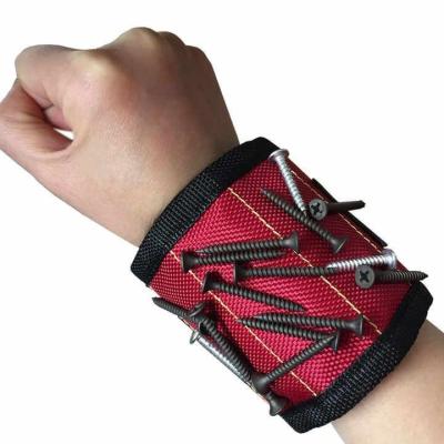 Cina Fascia di polso regolabile magneticamente con magneti forti per assorbire viti e trapano in vendita